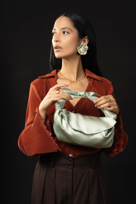 MLE Nodo Mini Clutch Satin Handbag in Celadon